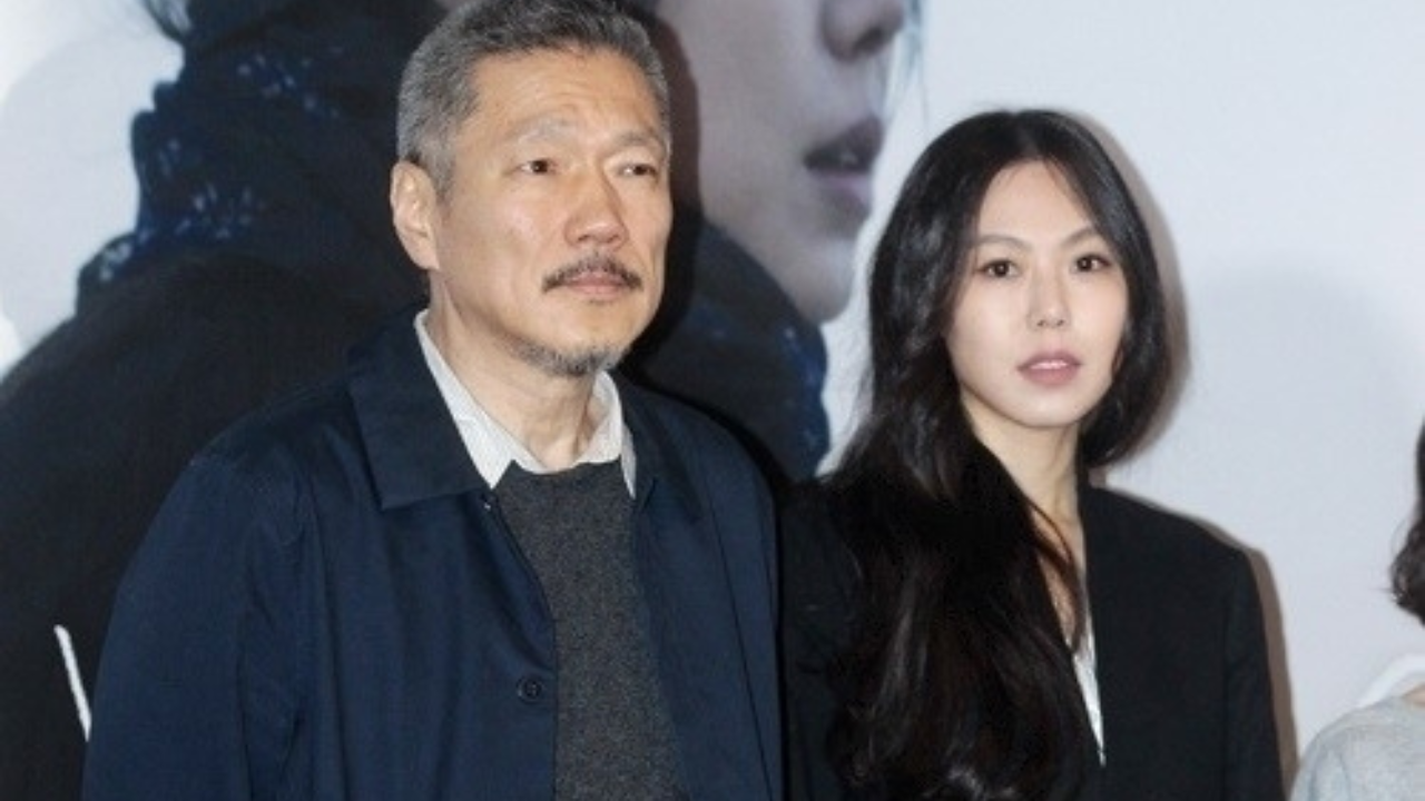 Hong Sang-soo and Kim Min-hee Spotted With Son at Airport—Stroller ...