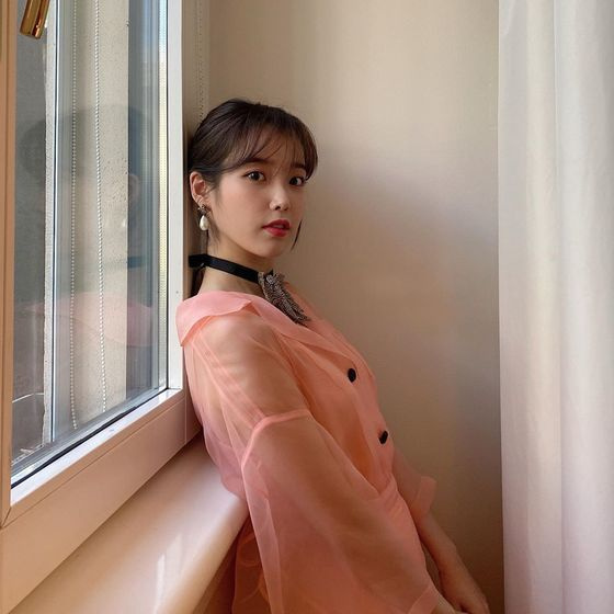 Check Out IU's Latest Photos: She Looks Like A Spring Goddess